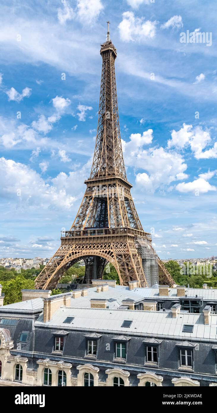 Paris, the Eiffel Tower, beautiful monument, and typical roofs in ...