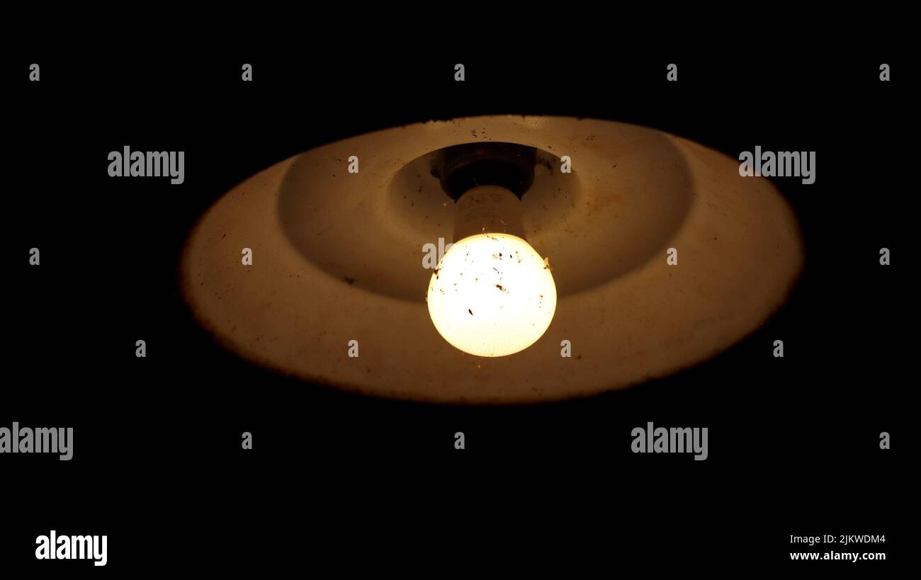 Ceiling light, viewed from below. dirty dusty and spider webs Stock ...