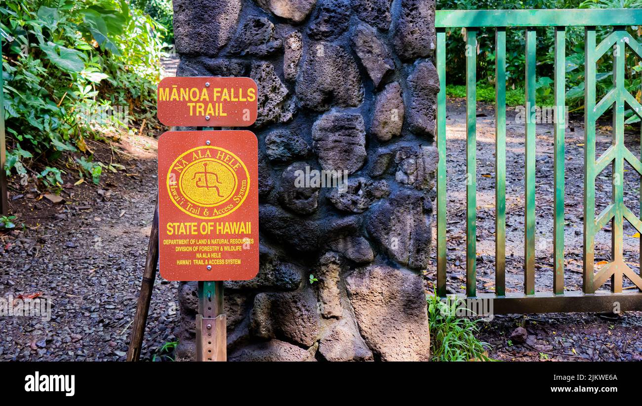 The sign in head part of the trail leading to Manoa Falls in Oahu ...