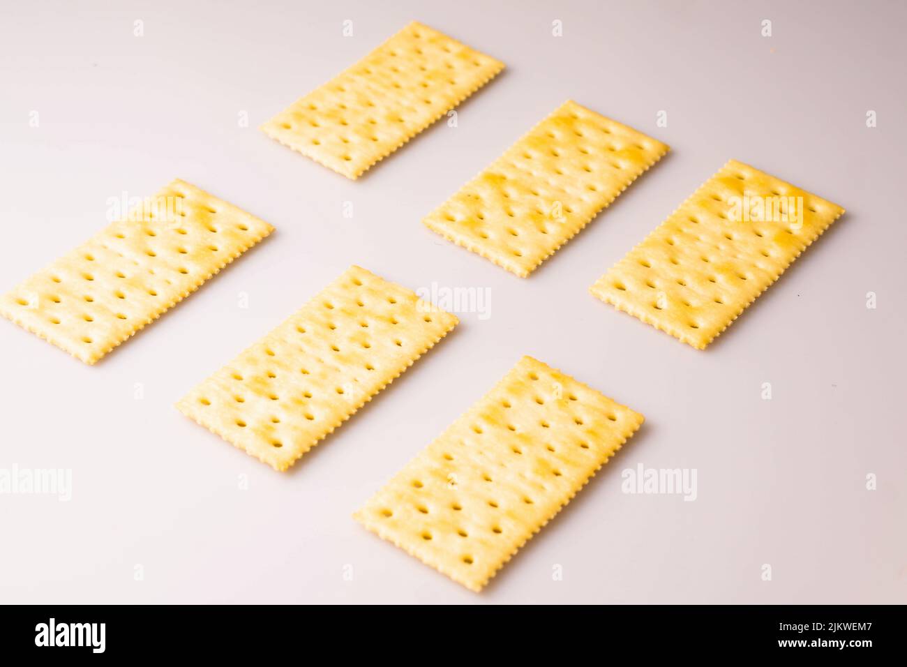 A closeup of six crispy crackers isolated on the white background Stock ...