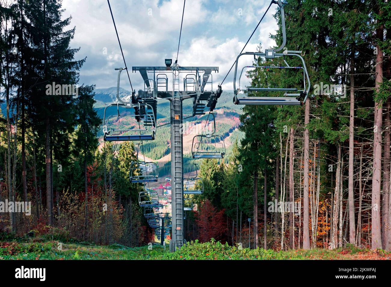 A chairlift in the forest with Bukovel background in Ukraine Stock ...