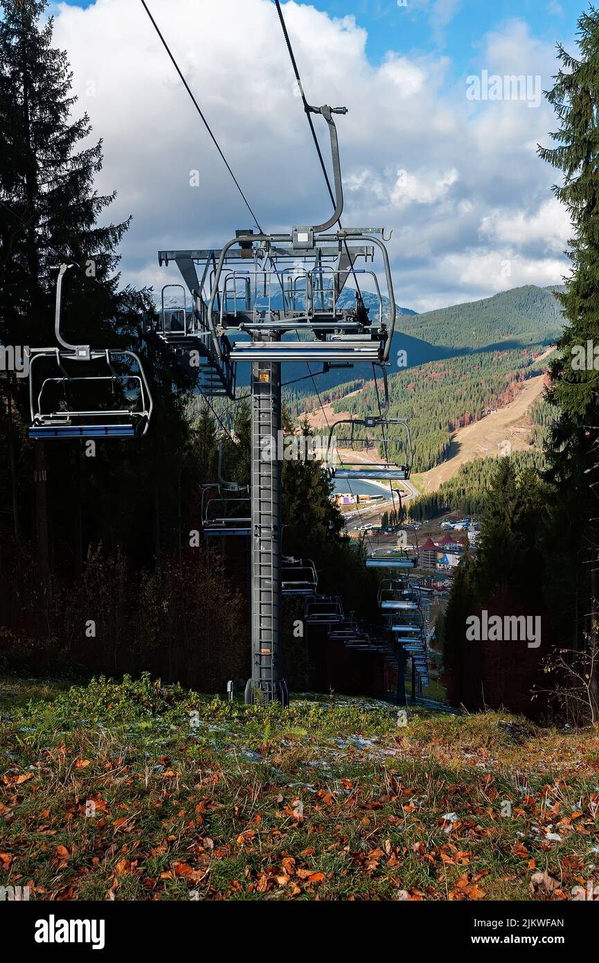 A chairlift in the forest with Bukovel background in Ukraine Stock ...