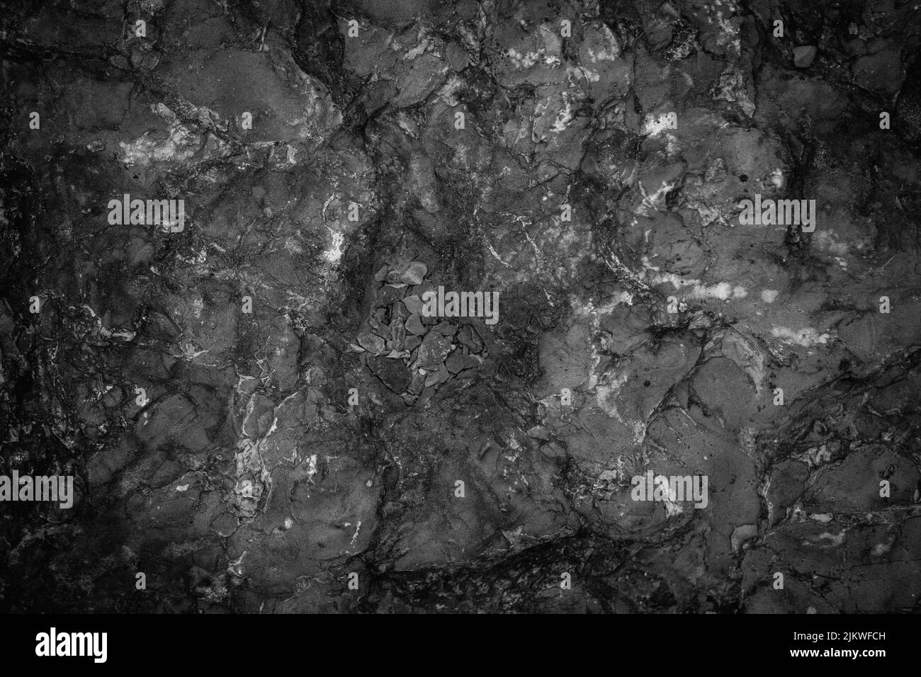 A grayscale view of a rock wall Stock Photo - Alamy
