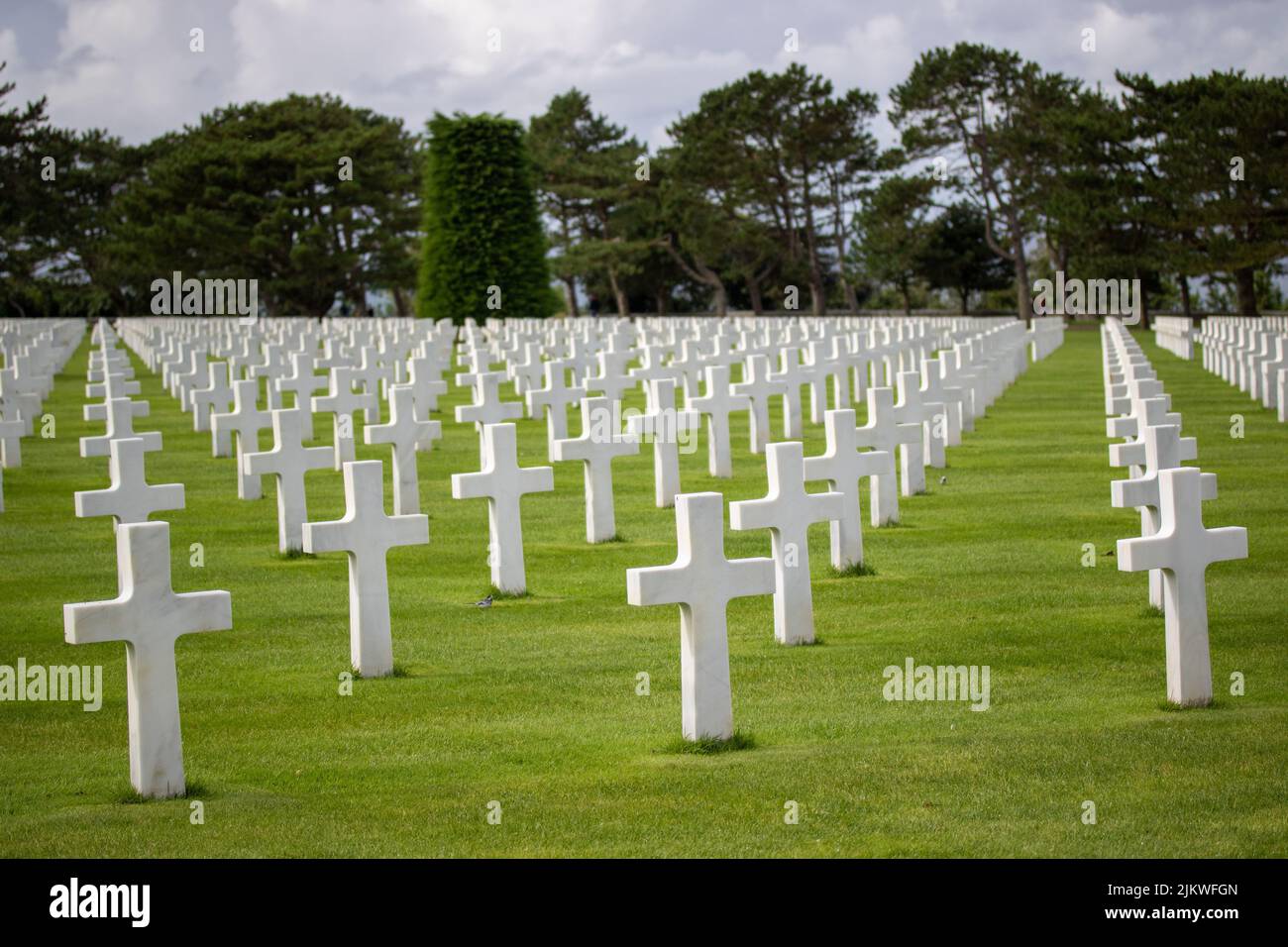 The Normandy American Cemetery and Memorial under the cloudy skies ...