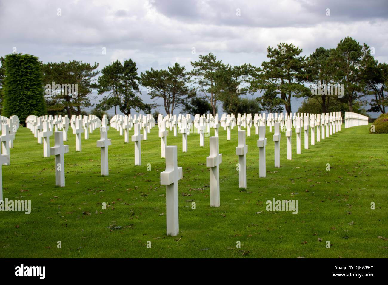 The Normandy American Cemetery and Memorial under the cloudy skies ...