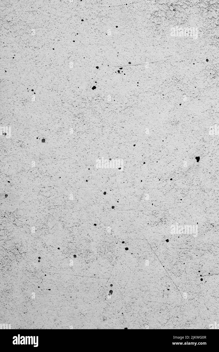 A grayscale view of a concrete wall with dots Stock Photo - Alamy