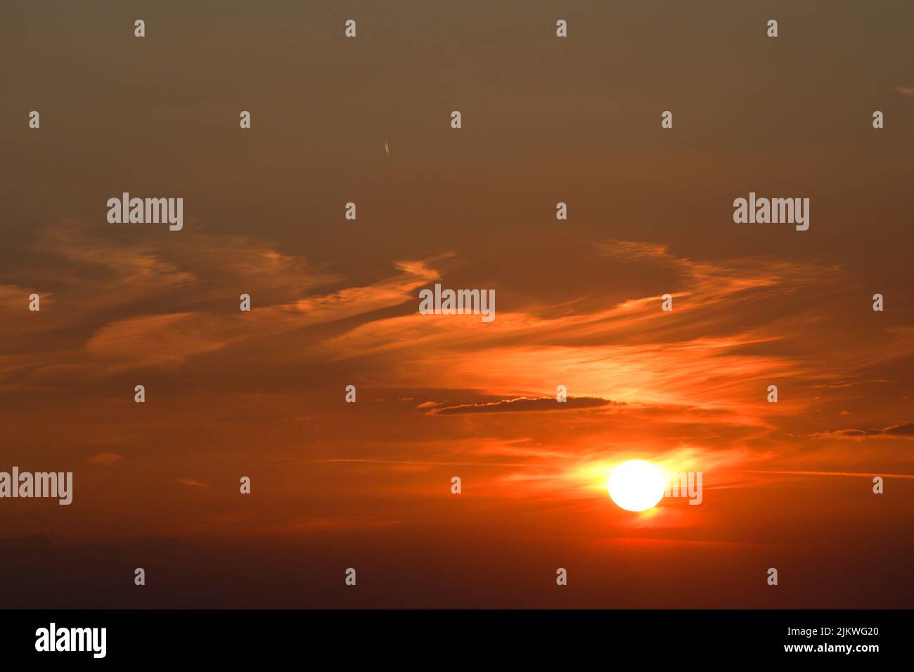 A view of a beautiful orange and red sunset that can be used as a ...