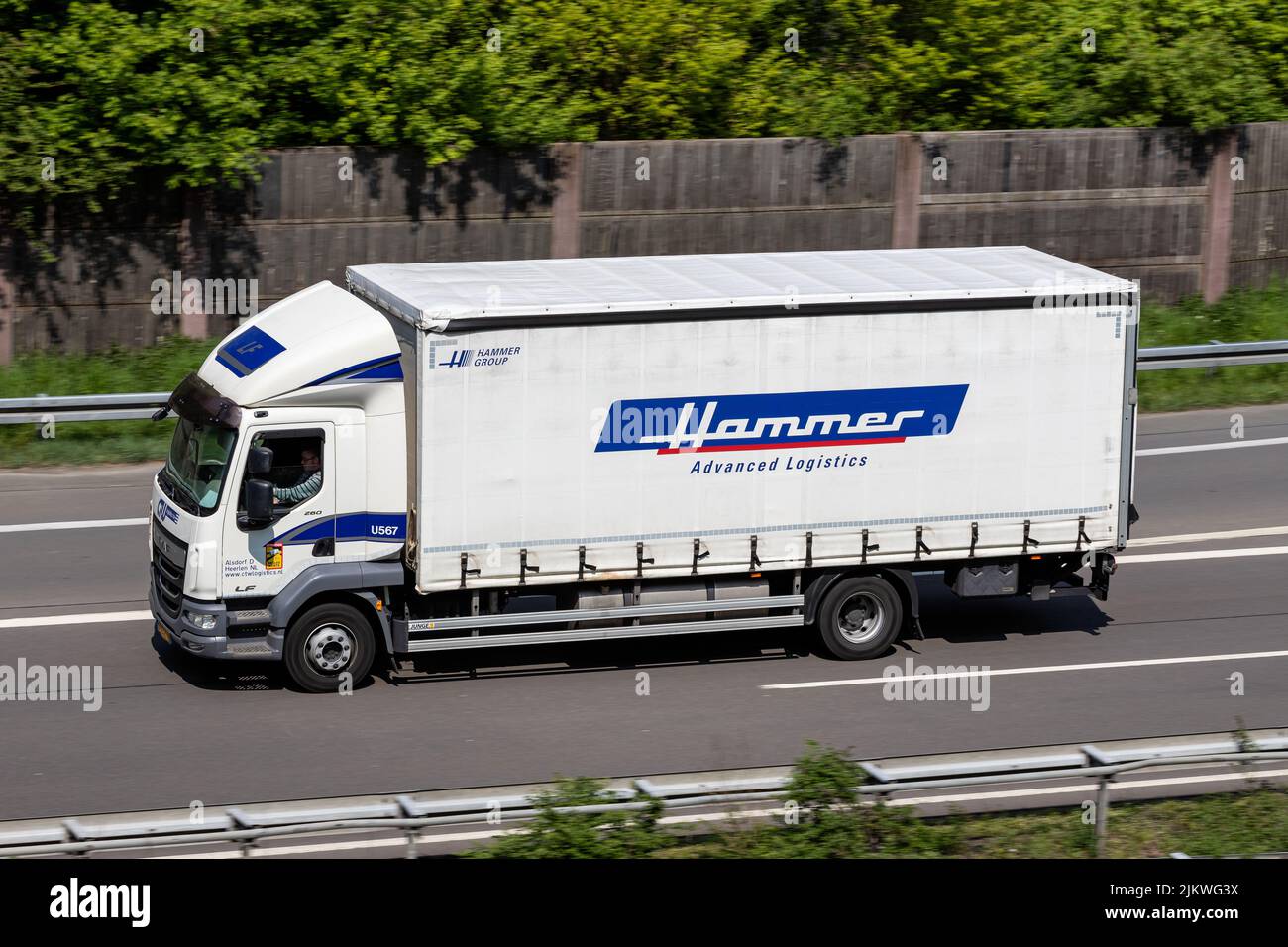 Hammer DAF LF truck on motorway Stock Photo - Alamy