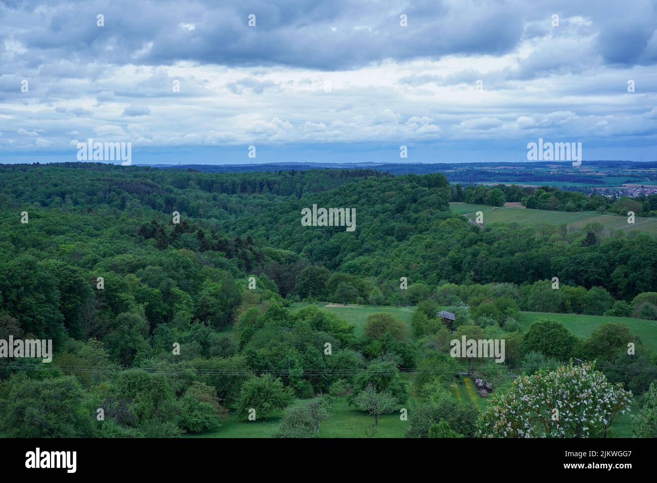 A horizontal shot of a landscape under a clear, cloudy sky Stock Photo ...