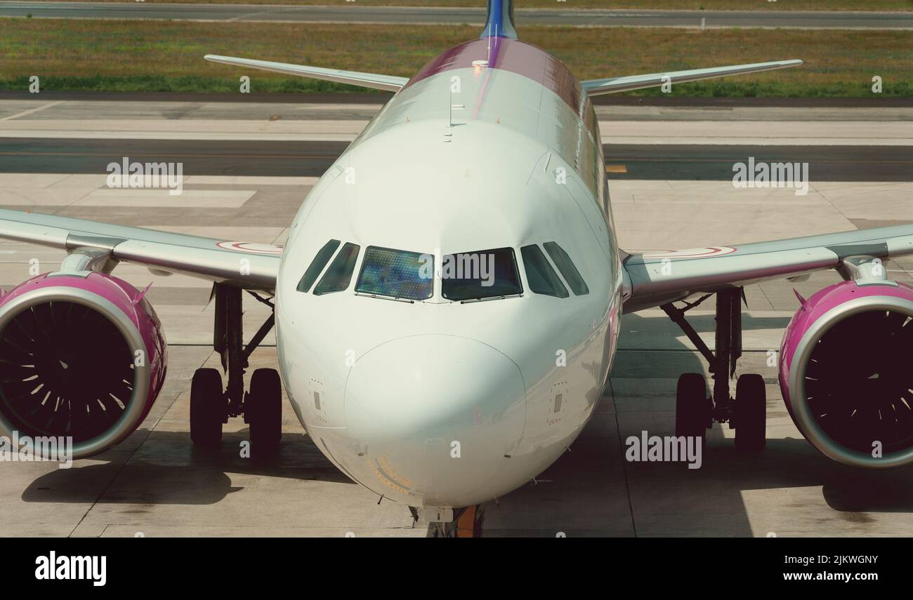 Close-up view of airplane on airfield in airport Stock Photo - Alamy