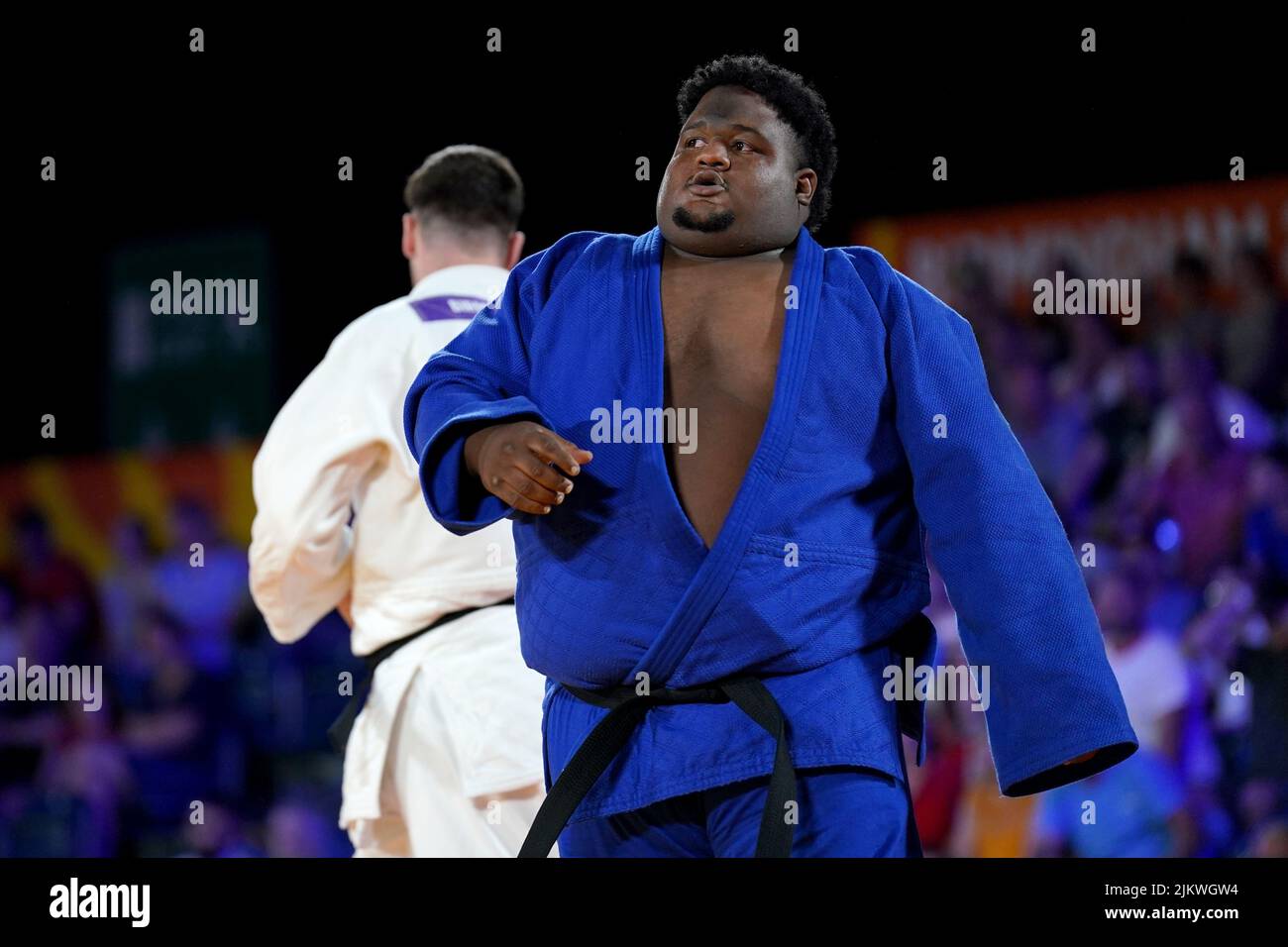 Mauritius’ Sebastien Perrinne (blue) looks on after defeating Scotland ...