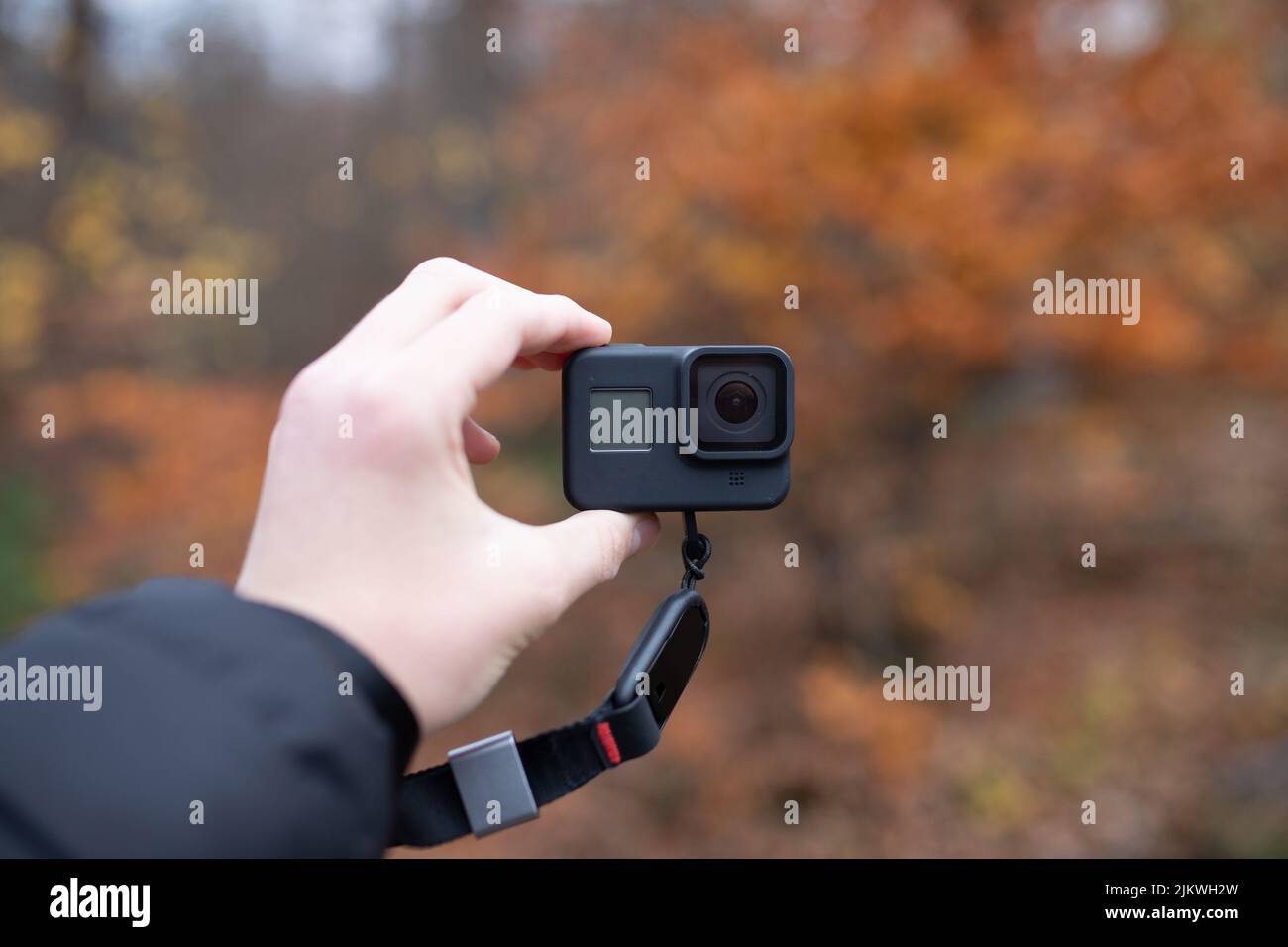 Hand on camera lens hi-res stock photography and images - Alamy