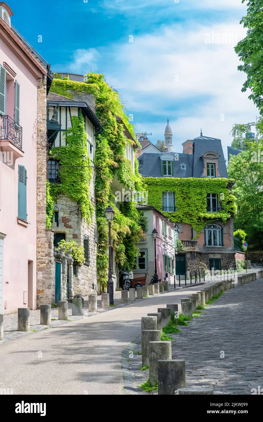 Paris, France, famous pink house and buildings in Montmartre, in a ...