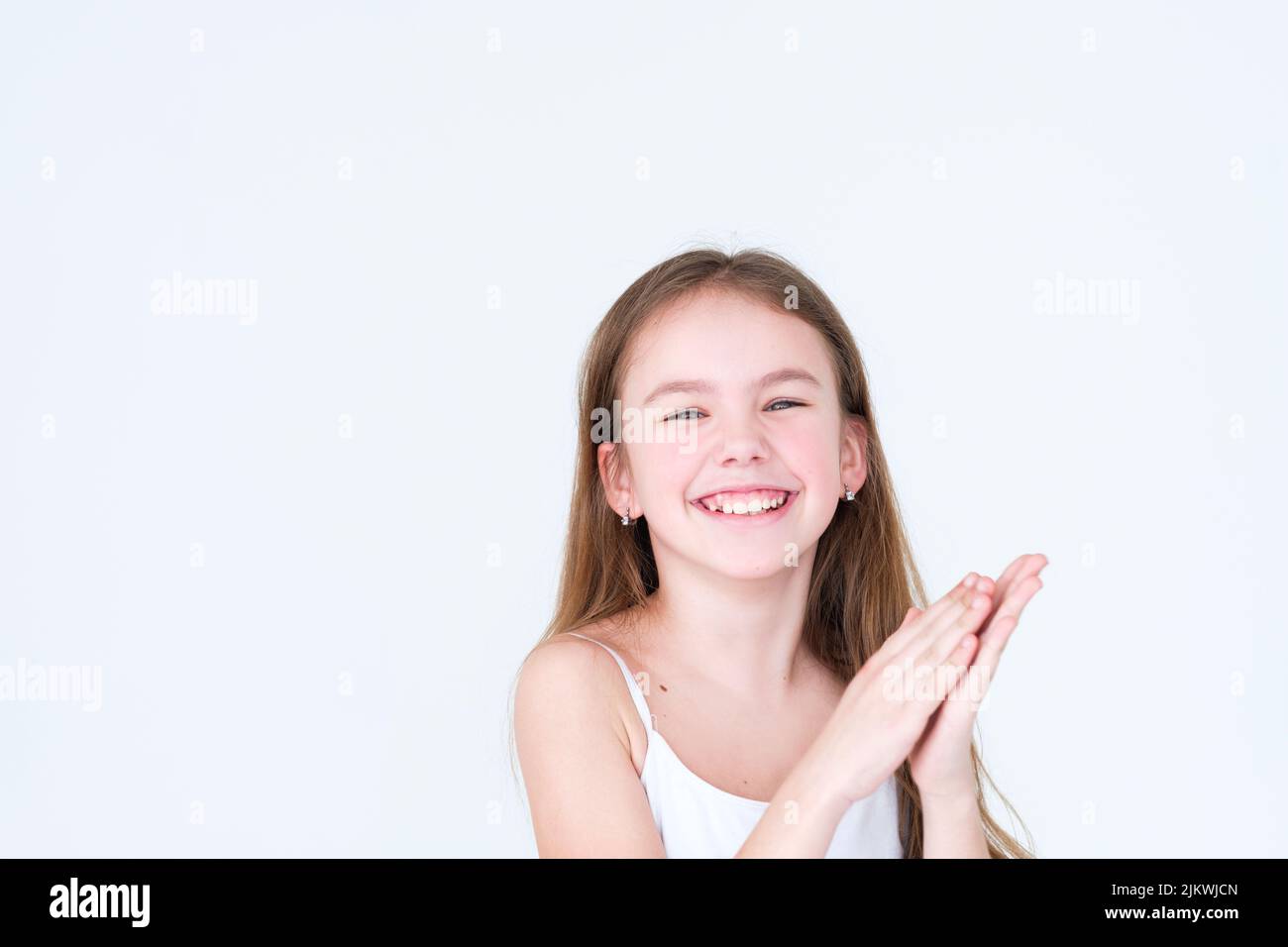 emotion happy joyful kid clapping hands girl Stock Photo - Alamy