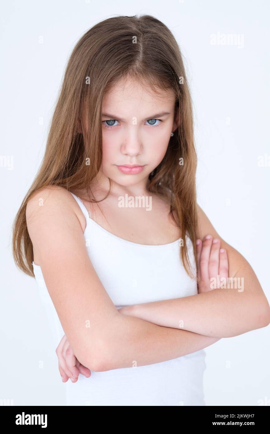 emotion sad hurt offended child girl crossed arms Stock Photo - Alamy