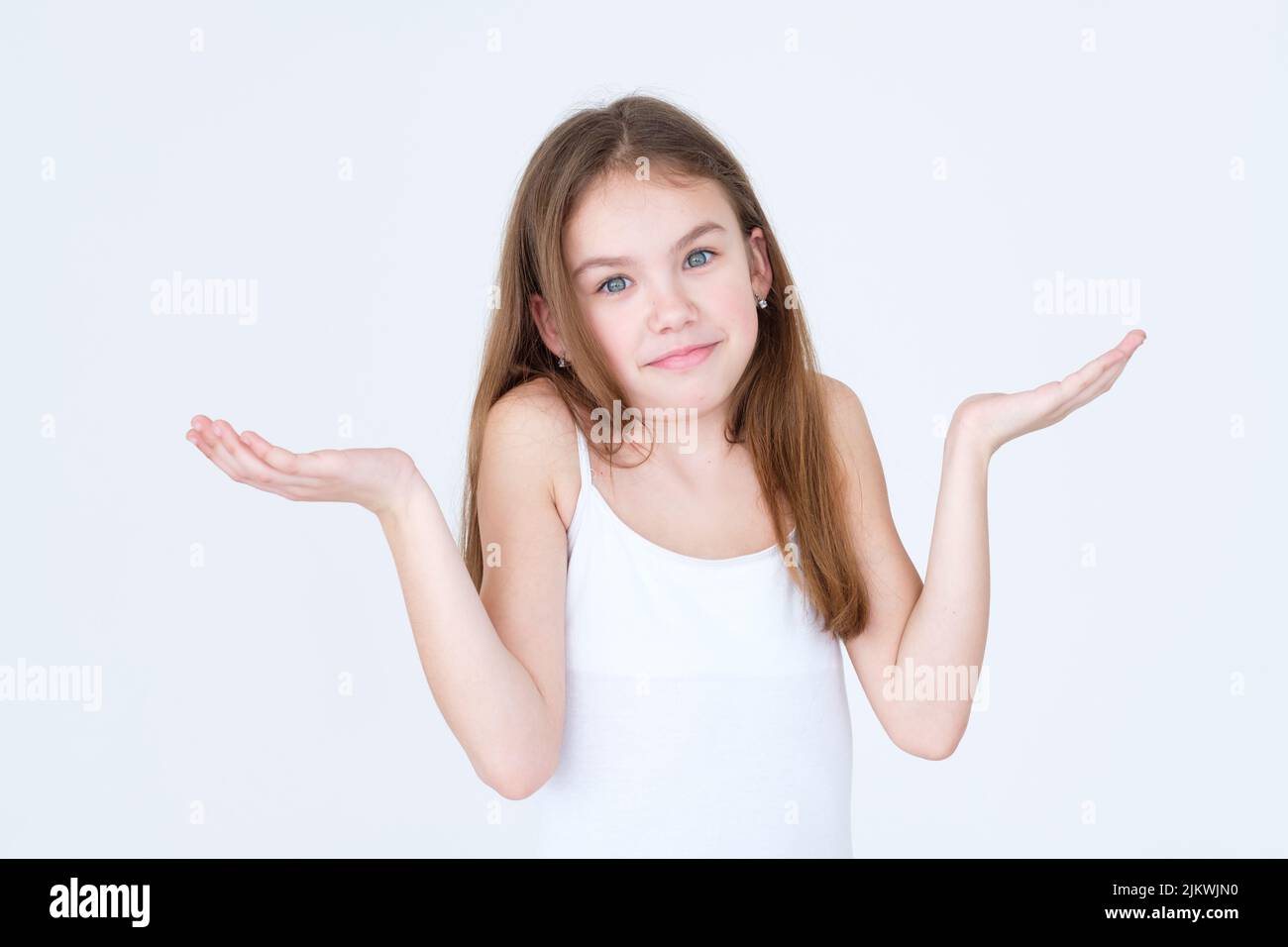 emotion confused clueless child lift hands dismay Stock Photo - Alamy