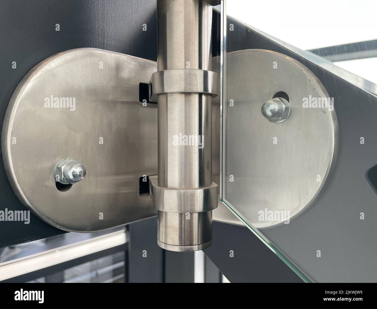 Modern chrome stainless steel fixing and clamp on staircase Stock Photo ...