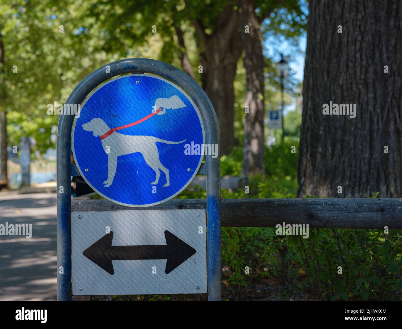 sign in park that means walking dog only on leash. High quality photo ...
