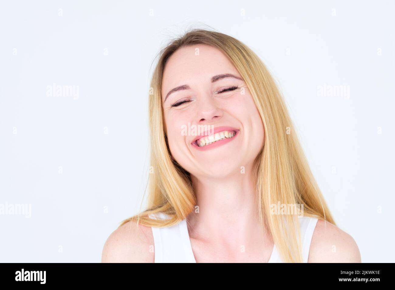 emotion face happy smiling cheerful pleased woman Stock Photo - Alamy