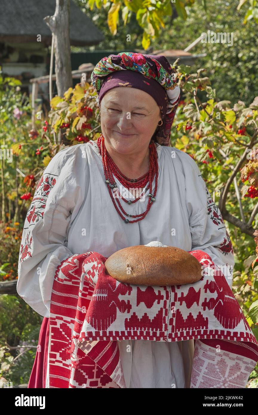 The unidentified old woman dressed in Ukrainian national costume ...