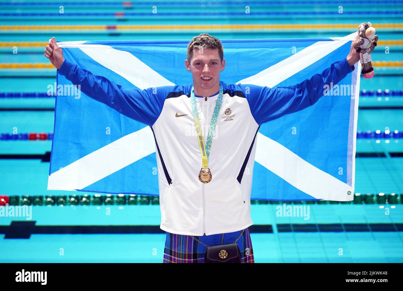 Scotland's Duncan Scott celebrates with the gold medal after winning ...