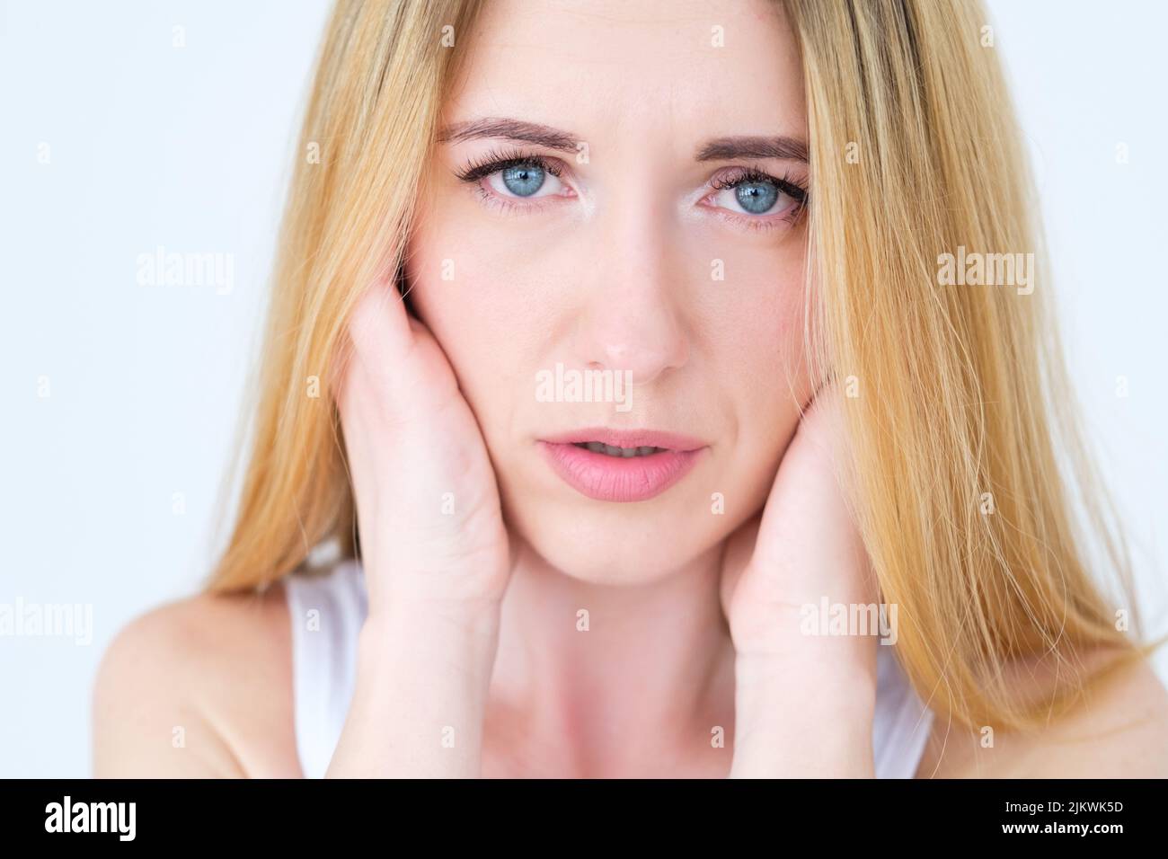emotion face sad worried upset concerned woman Stock Photo - Alamy