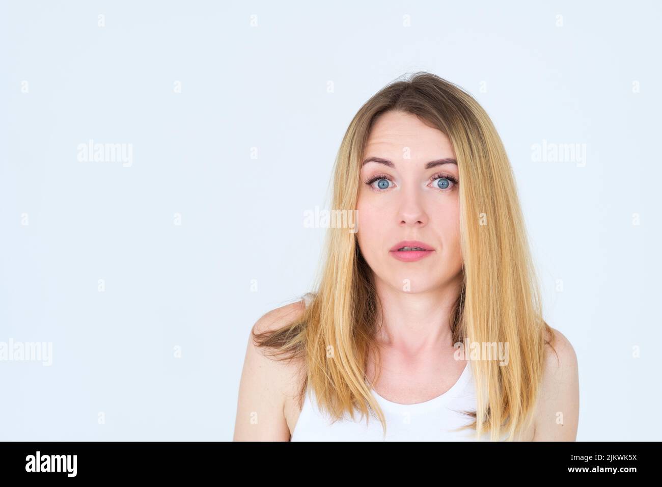 emotion face surprised woman raised eyebrows Stock Photo - Alamy