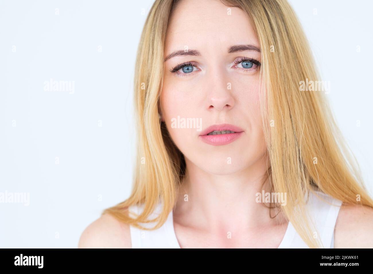 emotion face moody grumpy sullen upset woman Stock Photo - Alamy