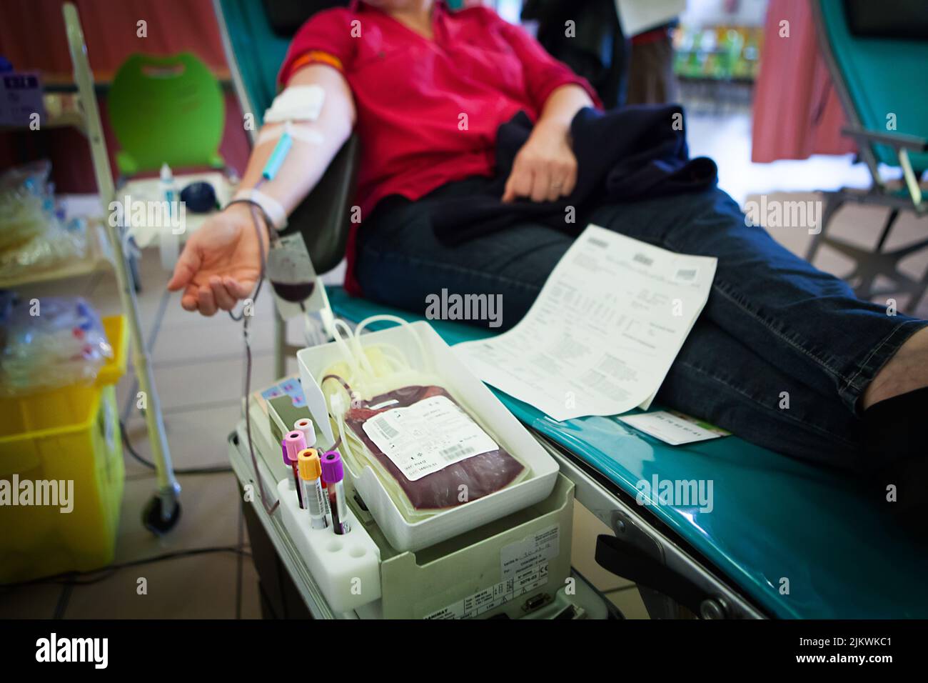 Blood donor in a blood collection facility Stock Photo - Alamy