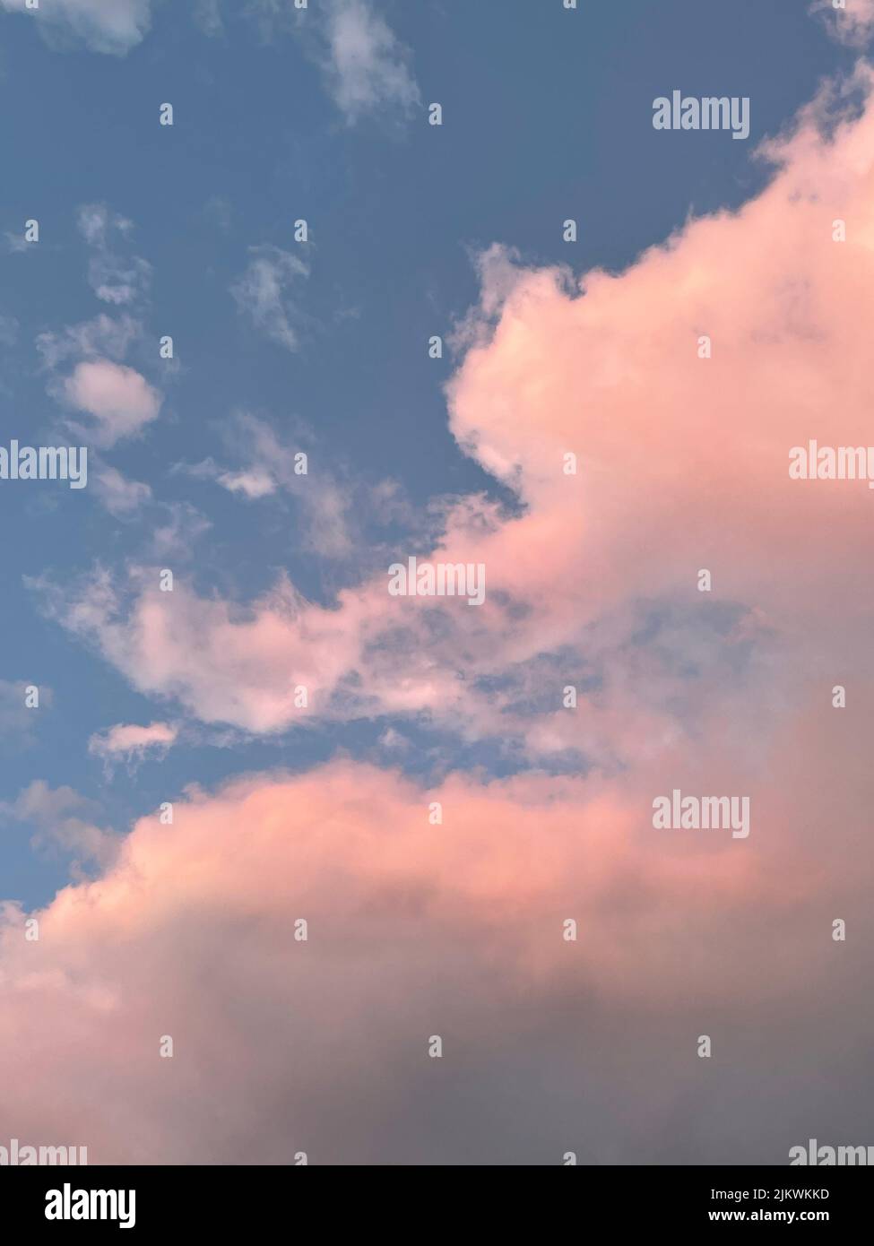 A perfect background of a blue cloudy sky Stock Photo - Alamy
