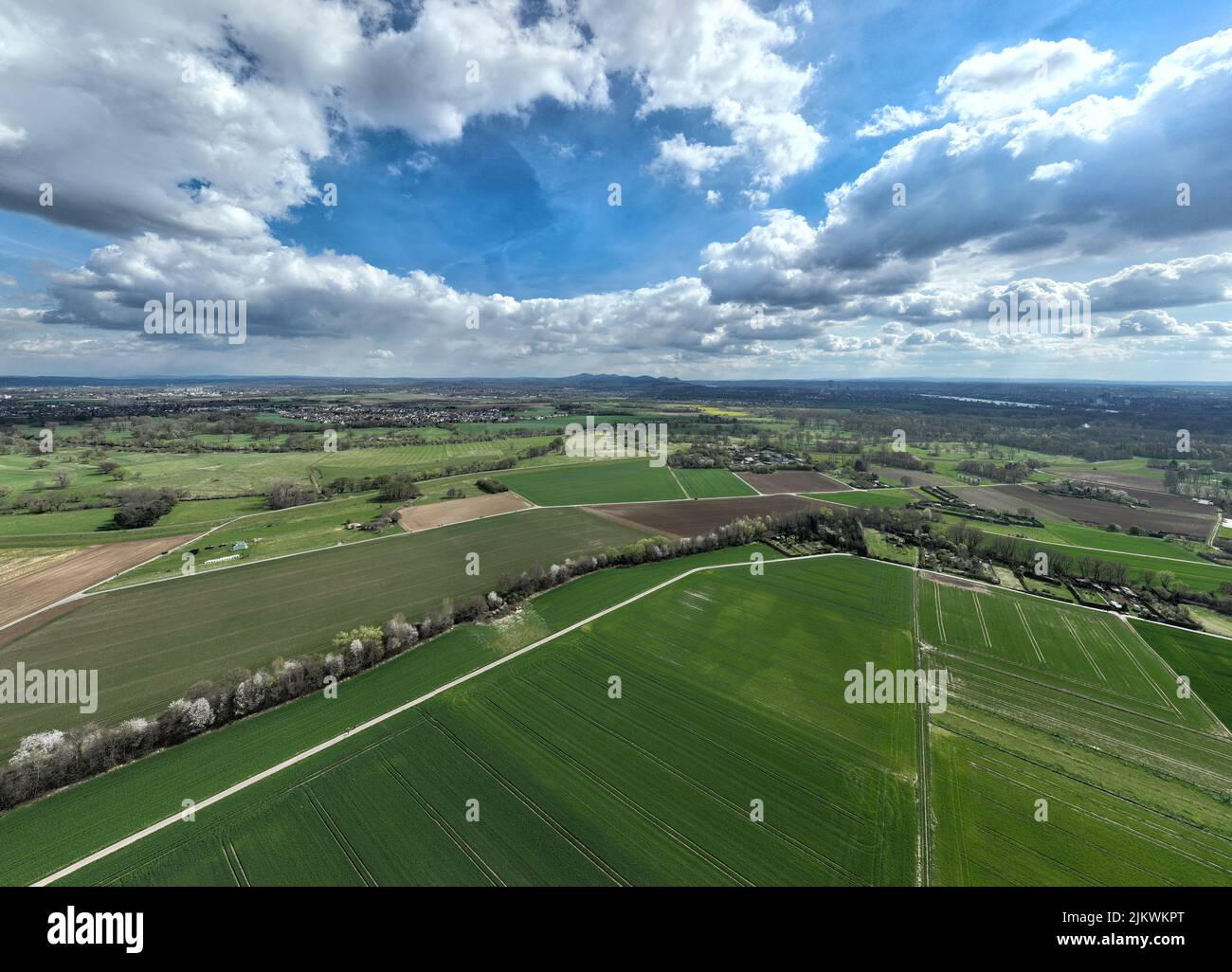 An aerial view of agricultural lands and a small town Stock Photo - Alamy