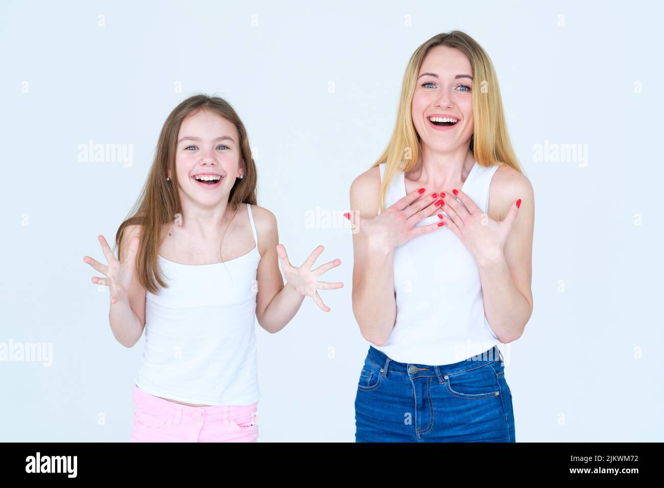 happy excited mother daughter surprise reaction Stock Photo - Alamy