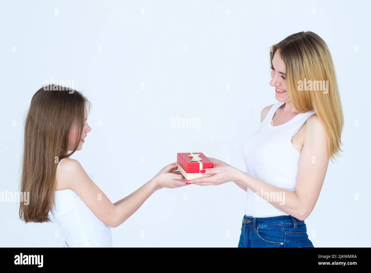 loving family relationship mom give present child Stock Photo - Alamy