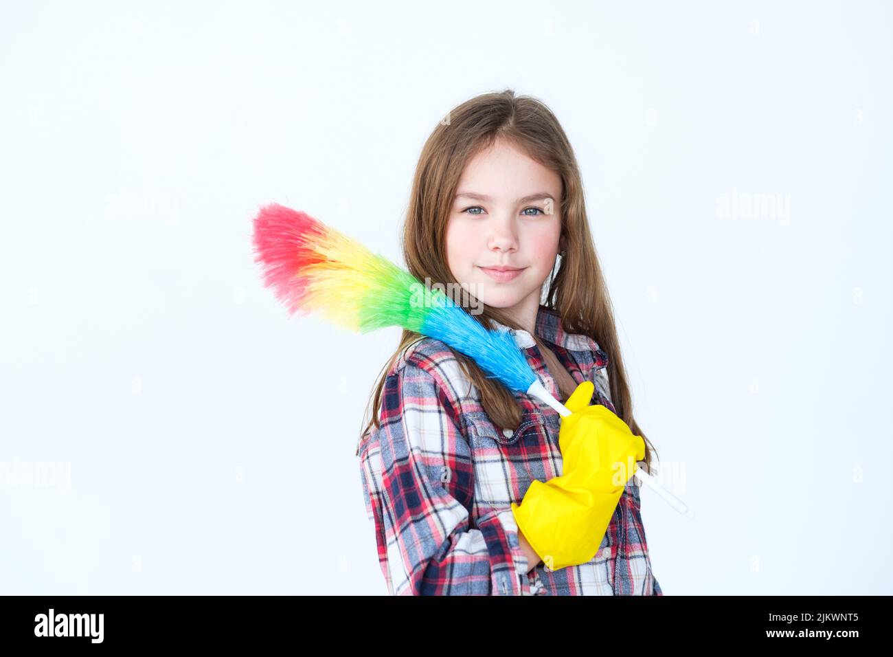 cleaning household chores girl helper glove duster Stock Photo - Alamy