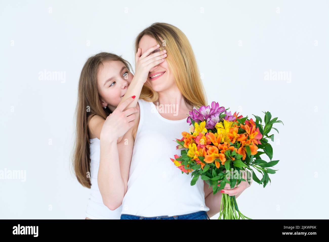 happy family loving daughter surprise flower bunch Stock Photo - Alamy