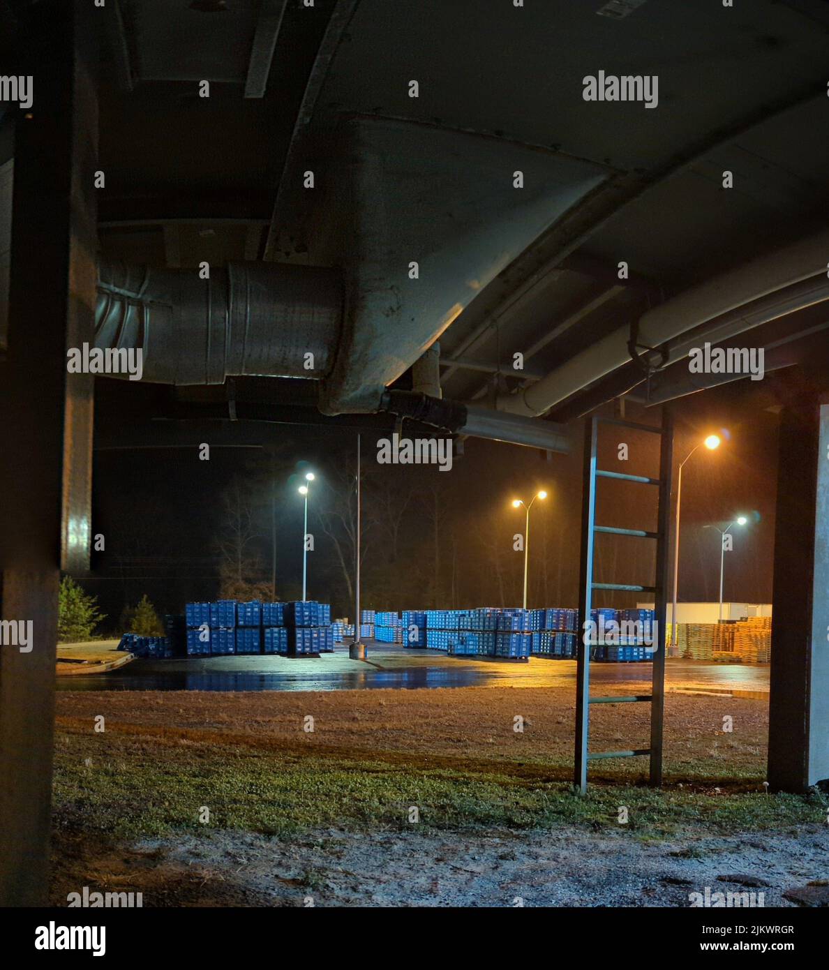 look at tote and pallet yard at local factory Stock Photo - Alamy