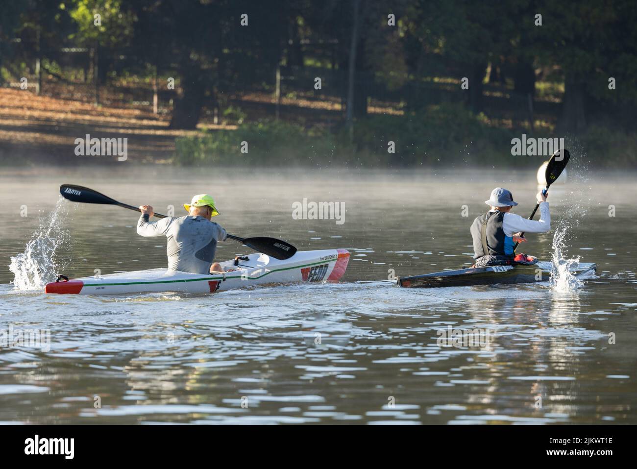 Two canoers training early morning Stock Photo - Alamy