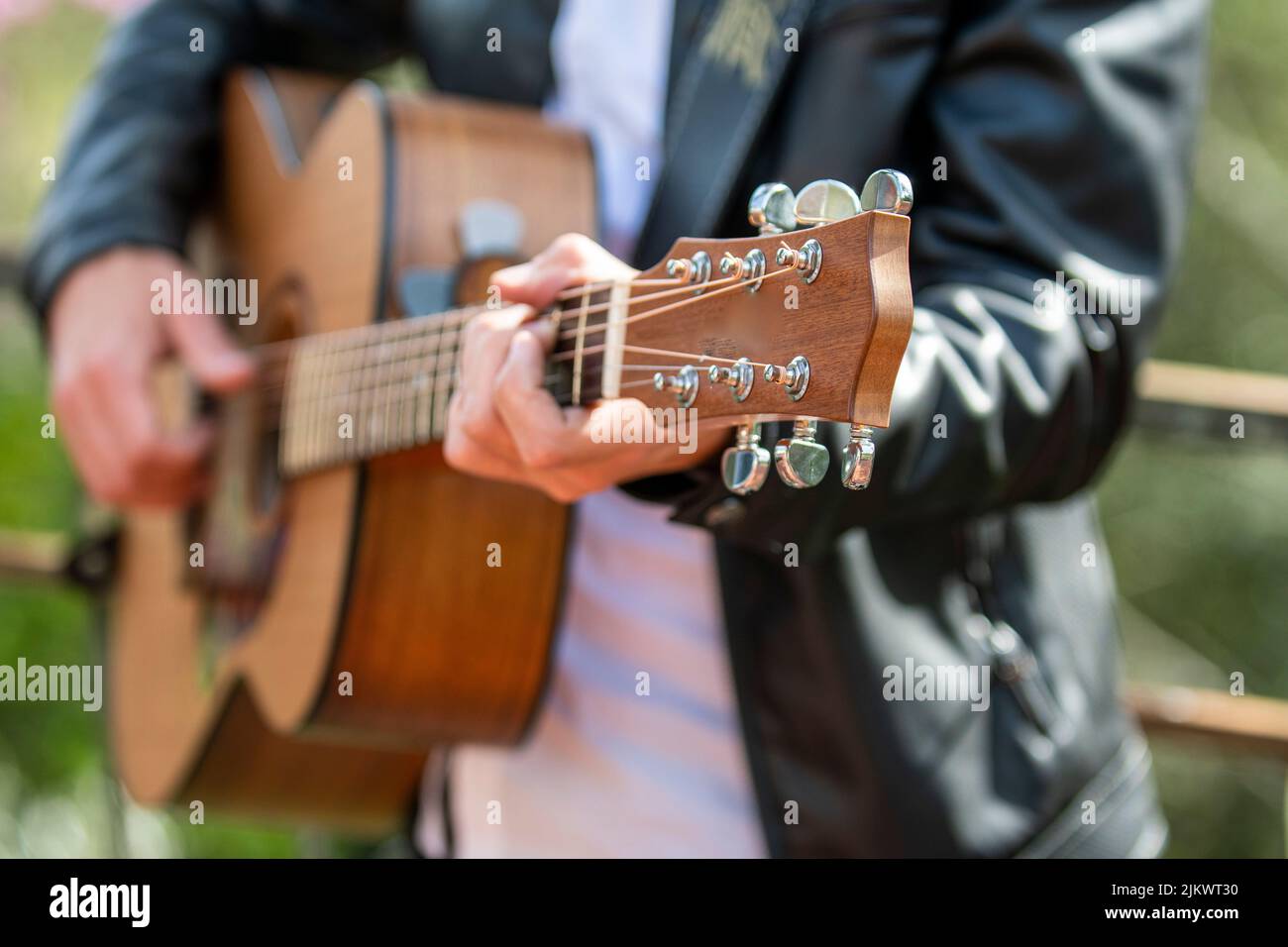detail of hands playing guitar in outdoor location in nature Stock ...
