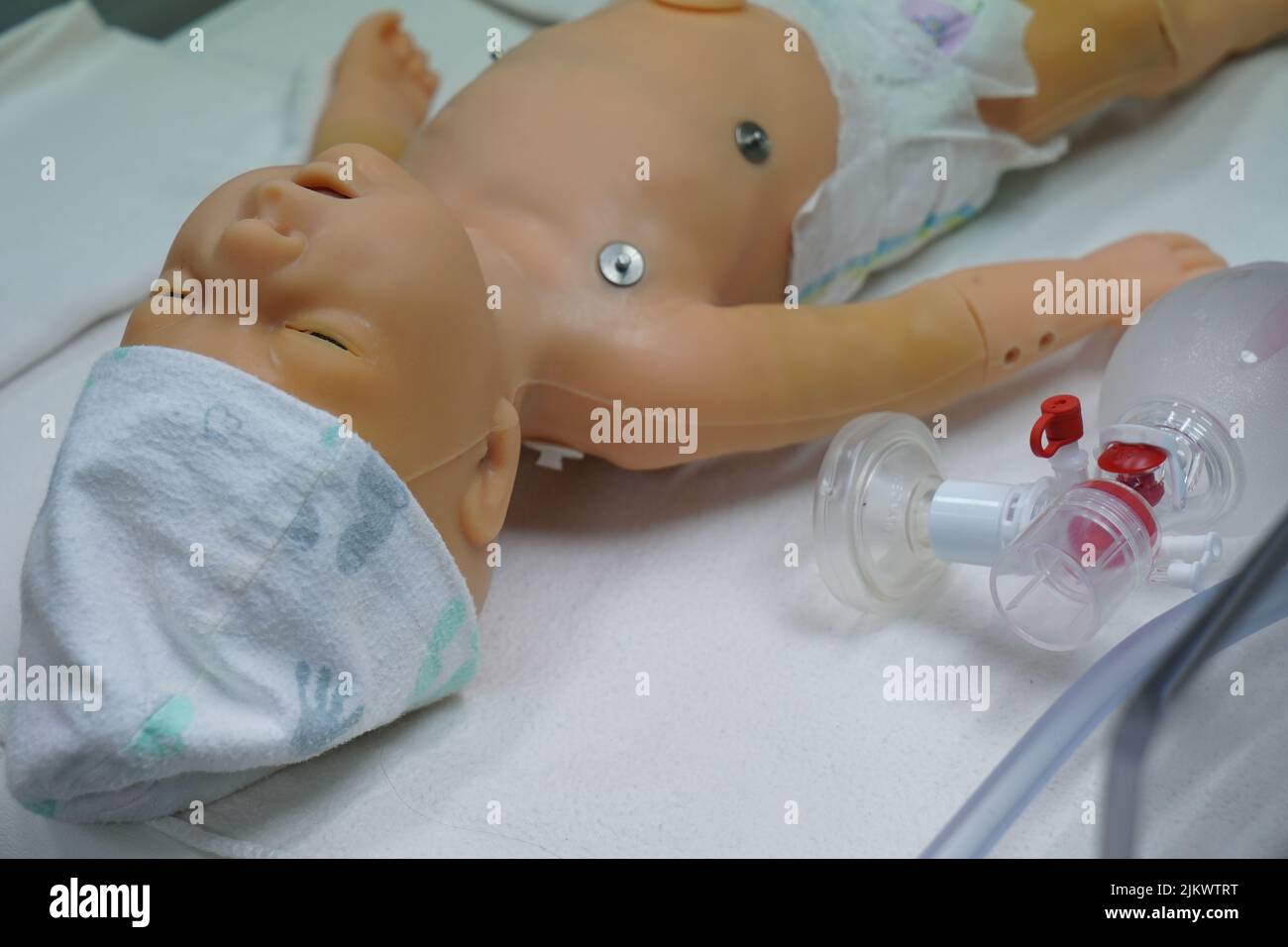 New born mannequin during a pediatric resuscitation simulation workshop ...