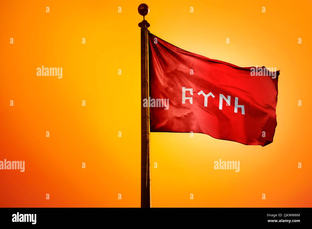 A digital illustration of a flag of the Gokturk Empire waving against a ...