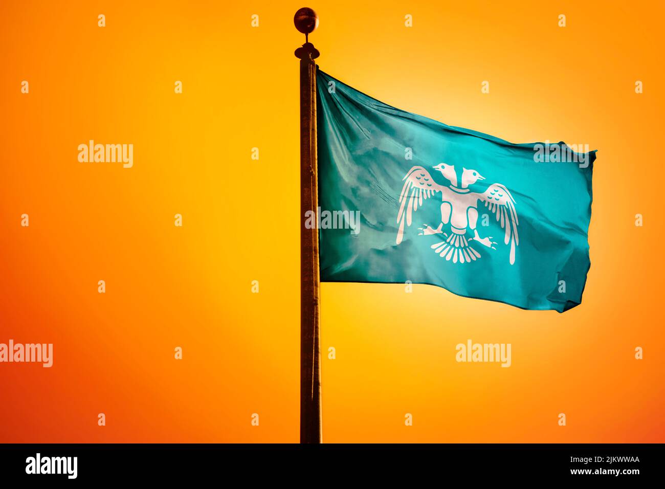 A digital illustration of a flag of the Seljuk Empire waving against a ...
