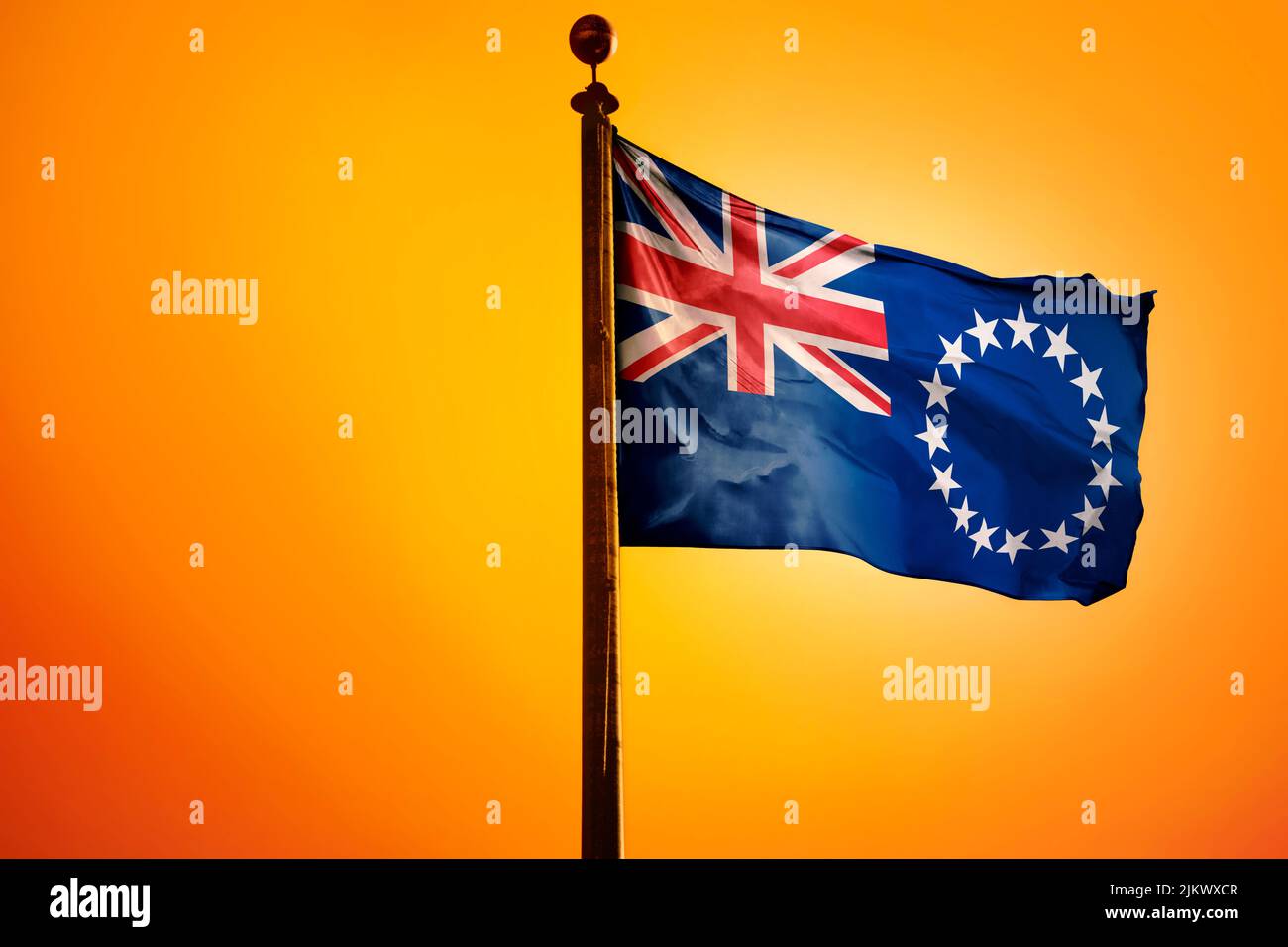A digital illustration of the flag of Cook Islands waving against a ...