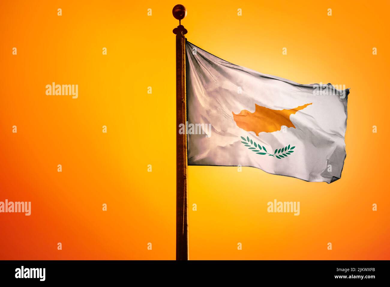 A digital illustration of the flag of Cyprus waving against a bright ...
