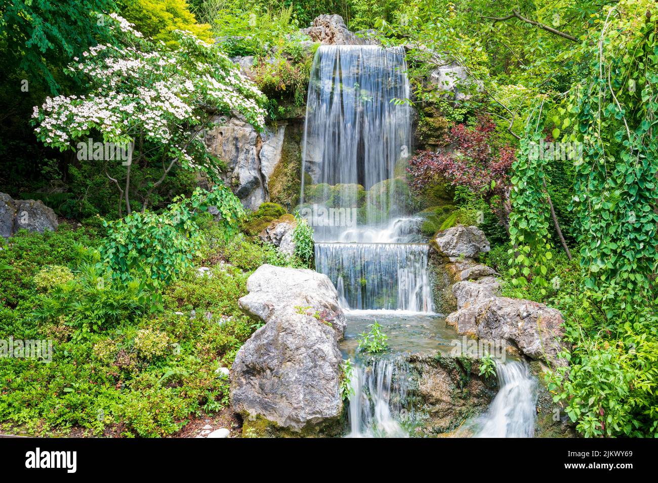 A mesmerizing view of waterfall rocky cascade between the nature Stock ...