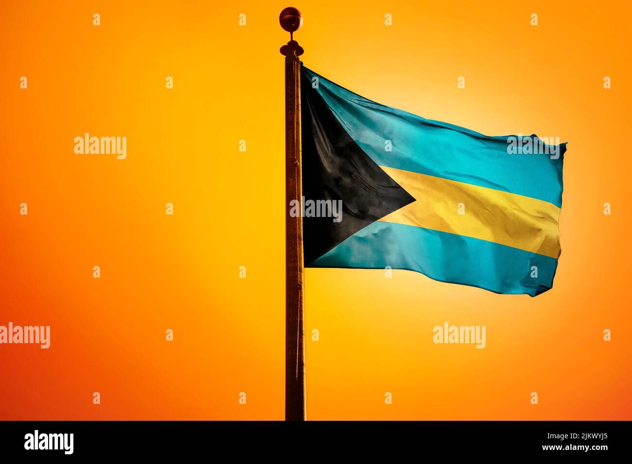 A 3D rendering of the Bahamas flag waving in the wind with an orange ...