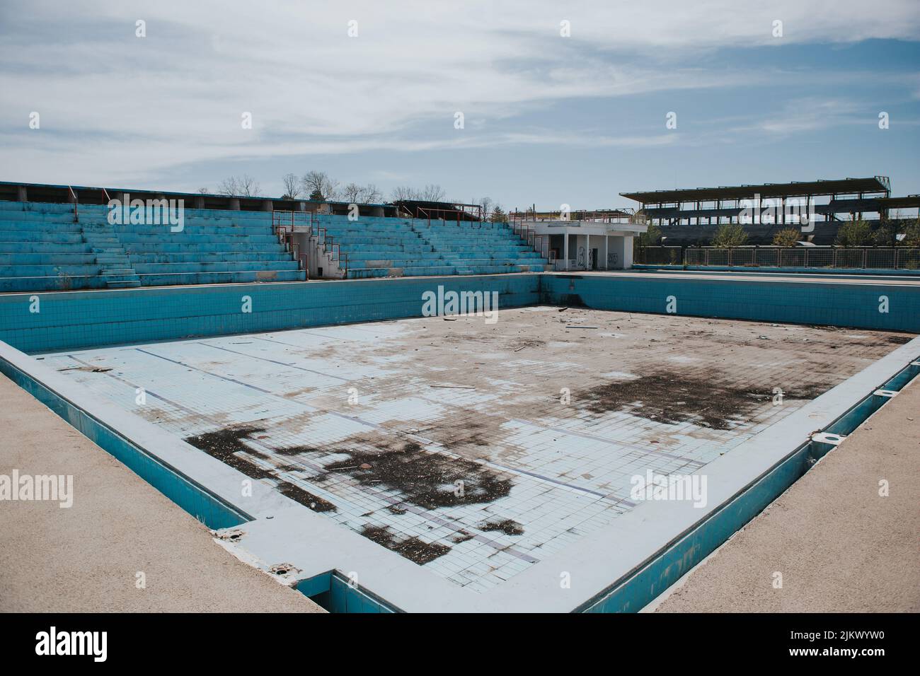 An Old empty dry outdoor swimming pool in a dry park Stock Photo - Alamy