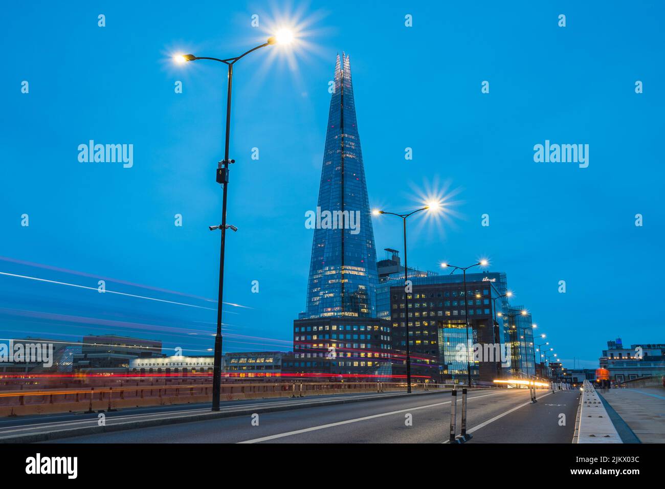 Traffic trails over London Bridge as The Shard towers above No.1 London ...