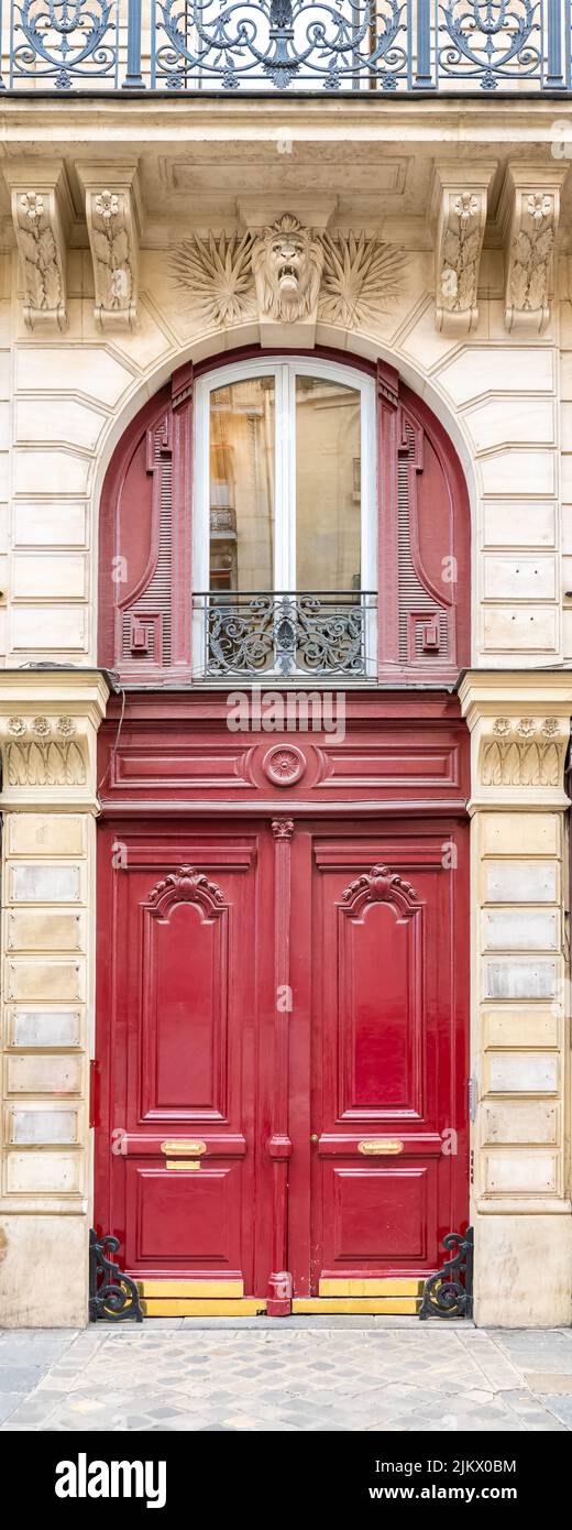 Paris, an ancient wooden door, typical building in the 8th ...