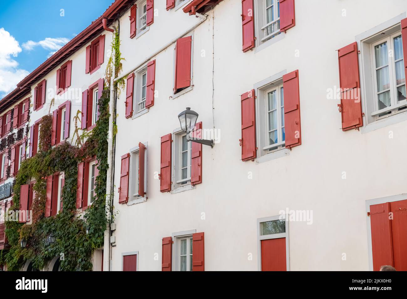 Typical houses in the village of Espelette in the Basque country ...
