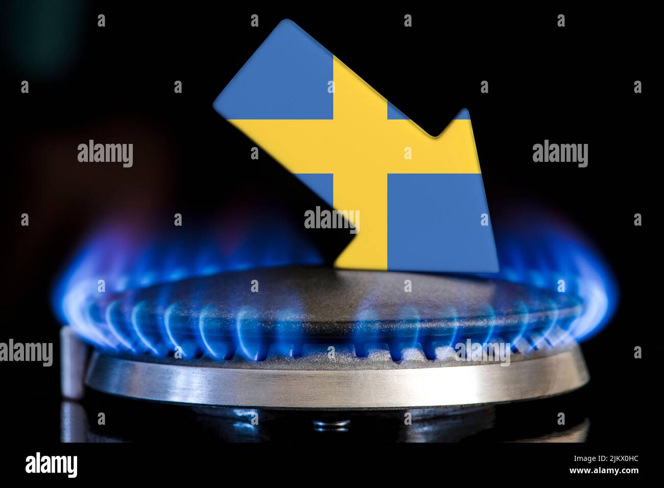 Decreased gas supplies in Sweden. A gas stove with a burning flame and ...